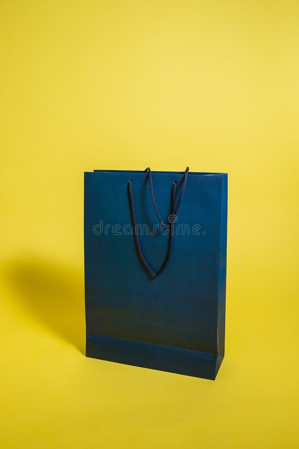 Blue Package on a Yellow Background Stock Image - Image of gift, buying ...