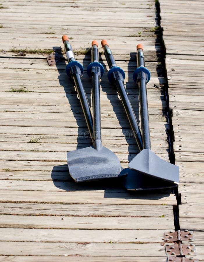 Blue Paddles on Pier stock photo. Image of paddle, blue - 7615490
