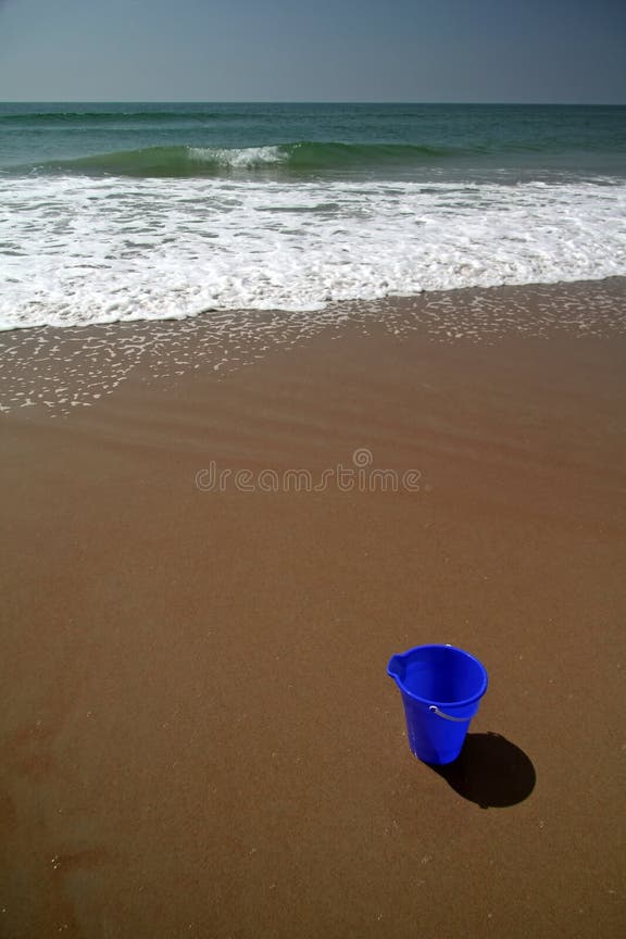 Blue pail on the beach stock photo. Image of recreation - 792886