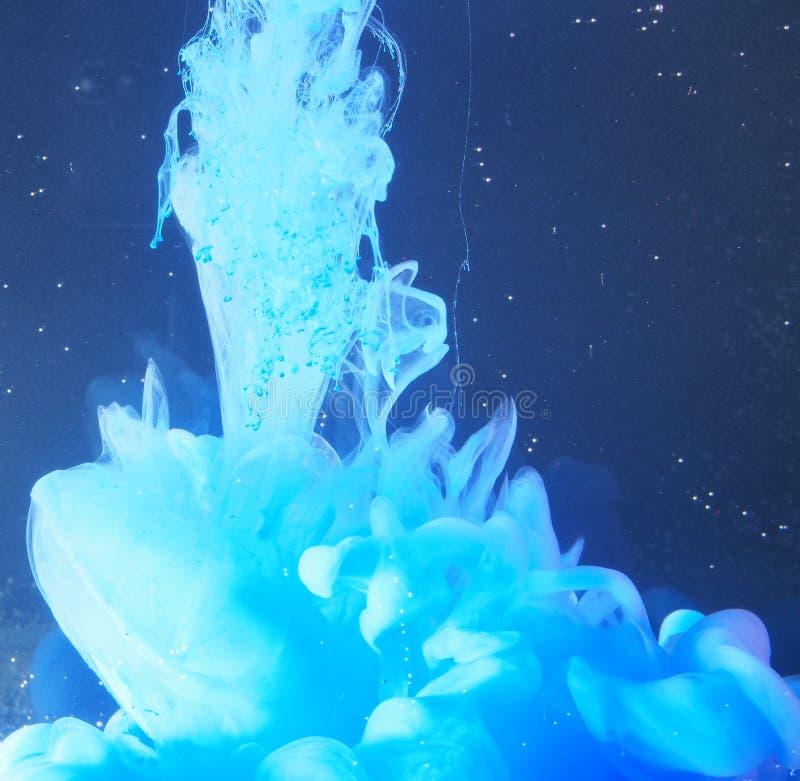Blue Paint is Mixed with Water. the Dissolution of Ink in Water Stock ...