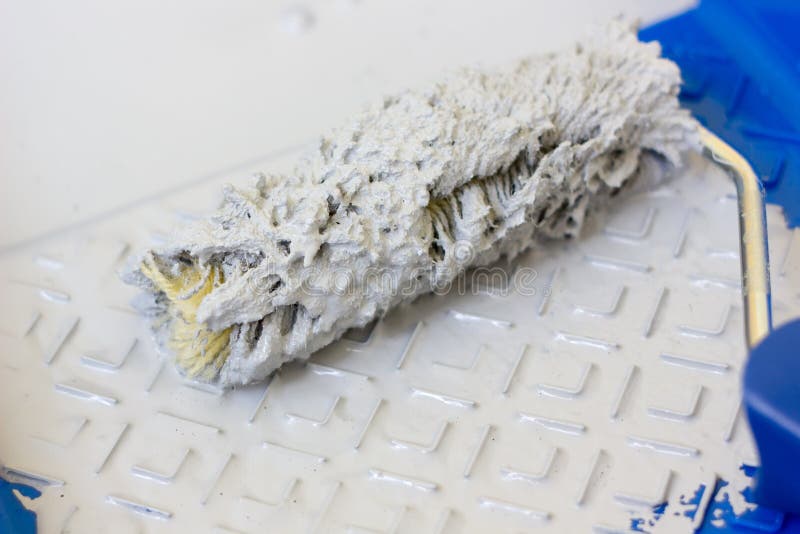 Blue Paint Tray with Paint Roller and Paint Inside it. Stock Image ...