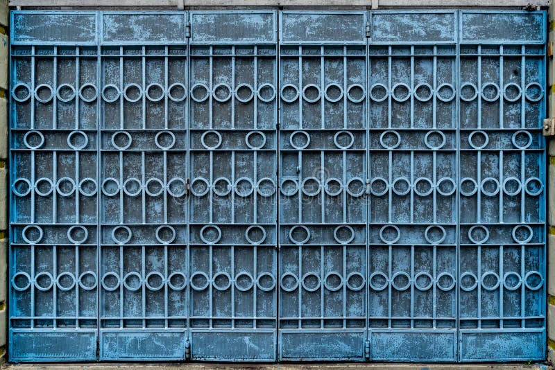 Blue Painted Folding Metal Gate Stock Photo - Image of aqua, circle ...