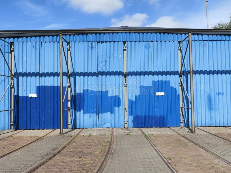 Blue Painted Metal Doors Ofan Old Shack or Barn Stock Photo - Image of ...