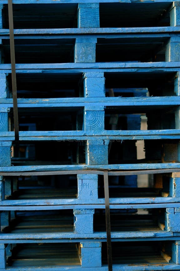 Blue Pallets stock photo. Image of merchandise, dark, industrial - 355198