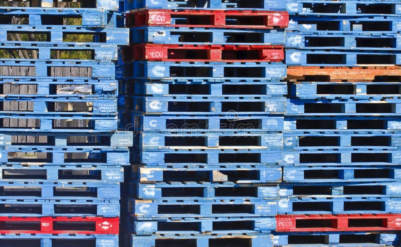 Blue Pallets with a Few Red Stock Image - Image of industrial ...