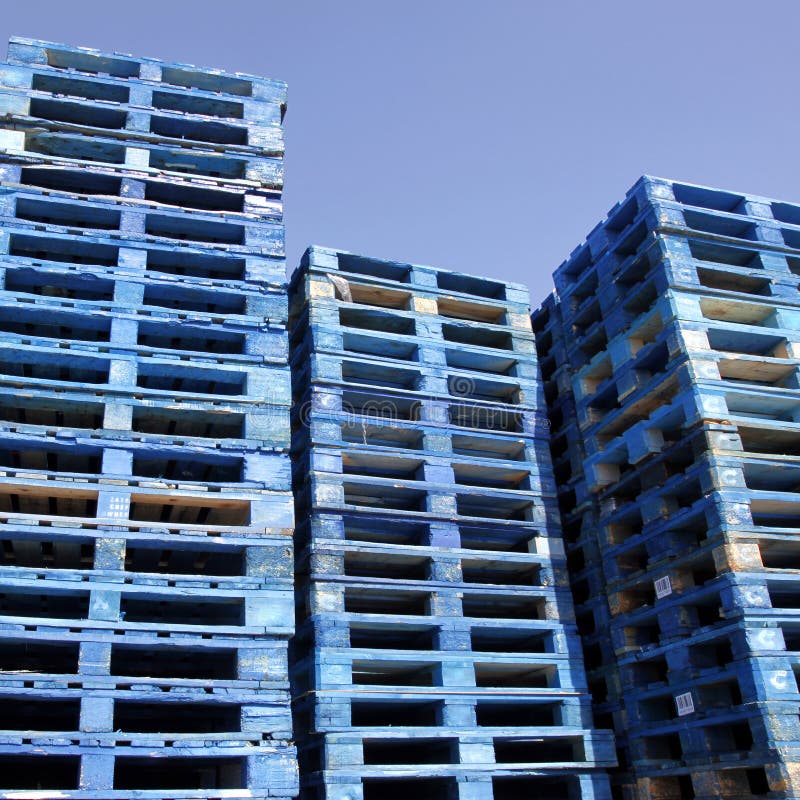Blue Pallets with a Few Red Stock Image - Image of industrial ...