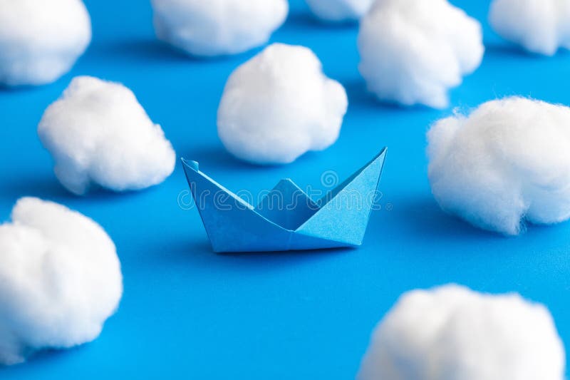 Blue Paper Boat with Clouds - Art for Decoration Stock Image - Image of ...