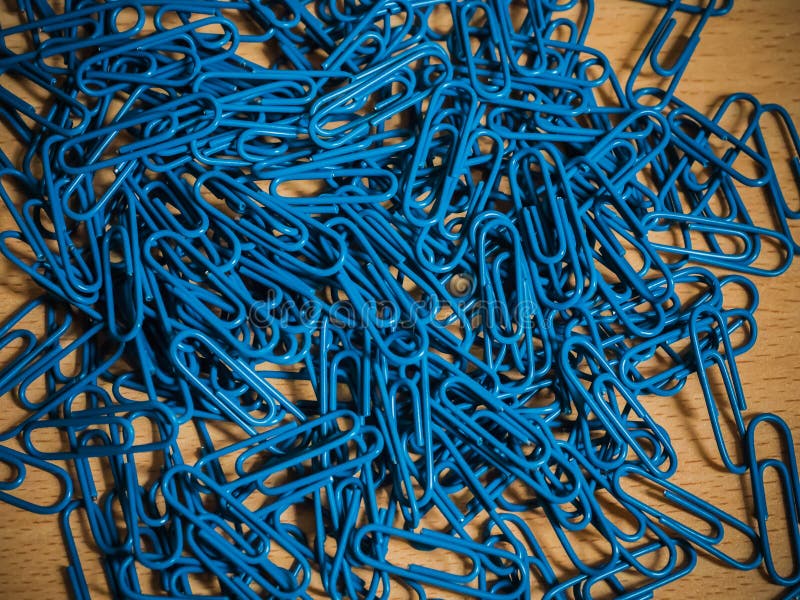 Blue paper clips stock image. Image of embracing, backgrounds - 89451145