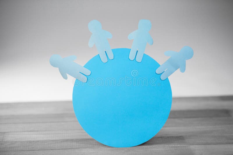 Blue Paper Cut Out Figures on Globe Stock Image - Image of shape, focus ...