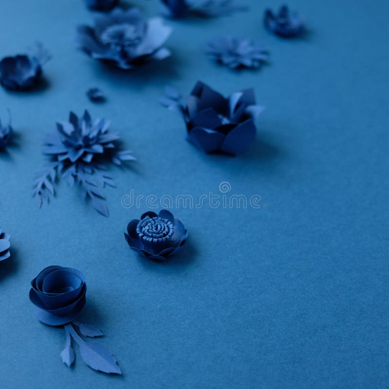 Blue Paper Flowers on Blue Background. Cut from Paper Stock Photo ...