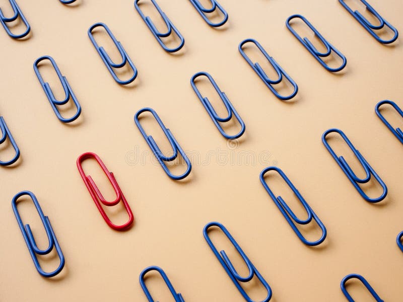 Blue Paperclips and One Red. Difference and Uniqueness Concept. Stock ...