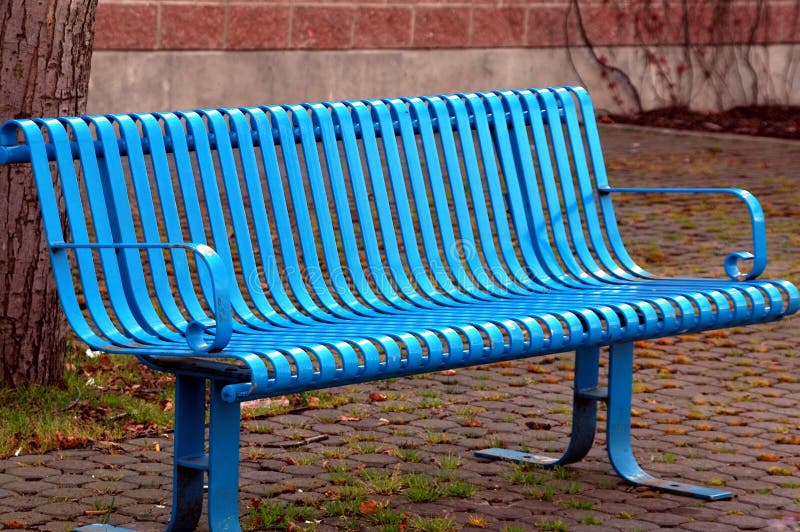 Blue park bench. stock image. Image of park, relax, comfort - 257681107