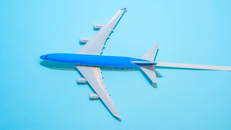 Blue Passenger Plane Top View. Copy Space Model of an Airplane in ...
