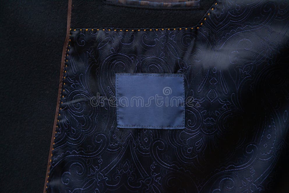 Blue Patch on Patterned Lining Inside Coat Stock Photo - Image of ...