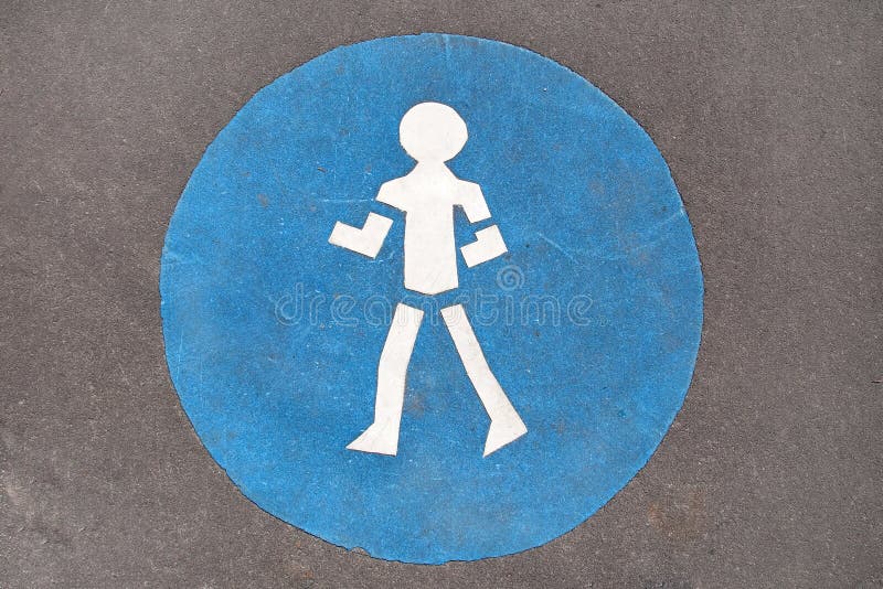 Blue Pedestrian Sign on Road Stock Photo - Image of blue, stenciled ...