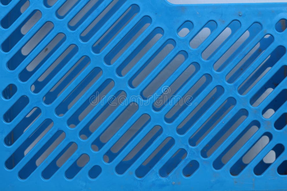 Blue Perforated Plastic Surface with Diagonal Slits Arranged in ...