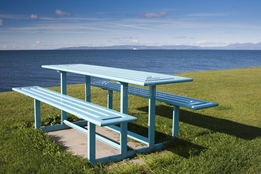 Blue Picnic Table by the Sea Stock Photo - Image of colourful, summer ...