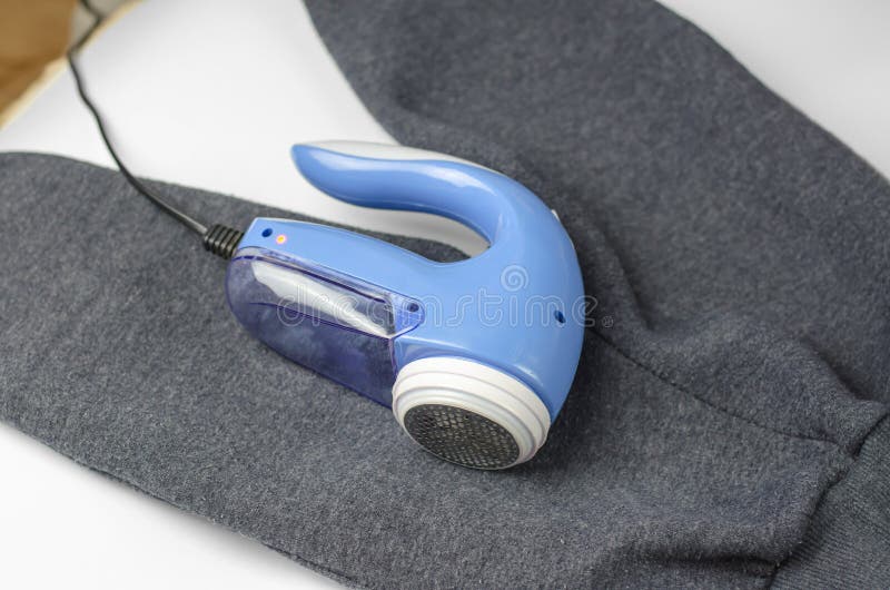 Blue Pilling Machine for Children`s Pants Stock Image - Image of ...