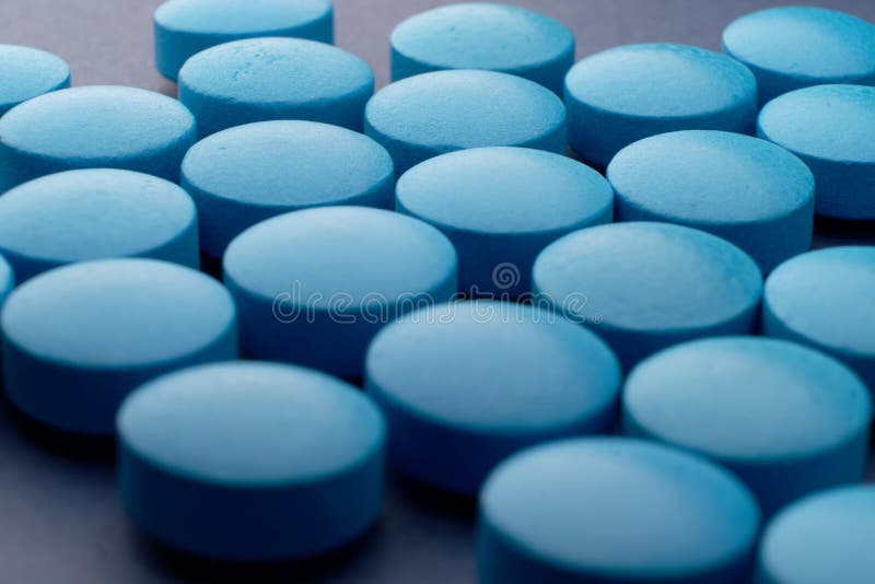 Blue Pills Macro. Many Blue Tablets Background Stock Image - Image of ...