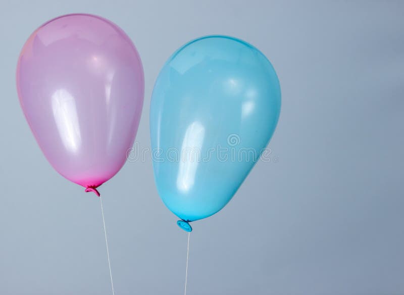 Blue and pink balloons stock photo. Image of blue, colorful - 140044824