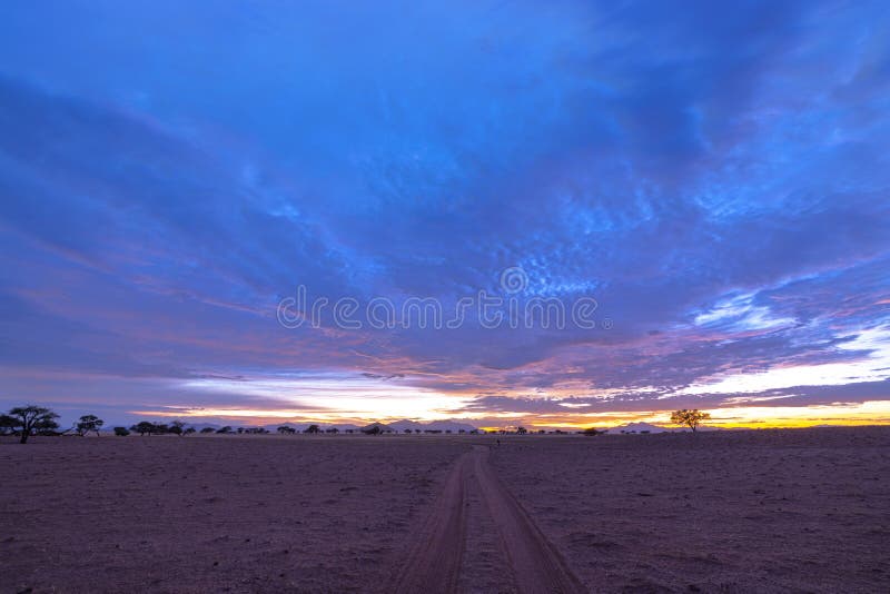 Yellow Sunset and Clouds at the Dune in Namib Desert Stock Photo ...
