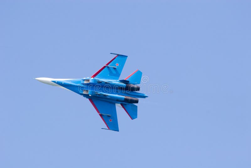 Blue plane in blue sky stock image. Image of team, manoeuvre - 1281857