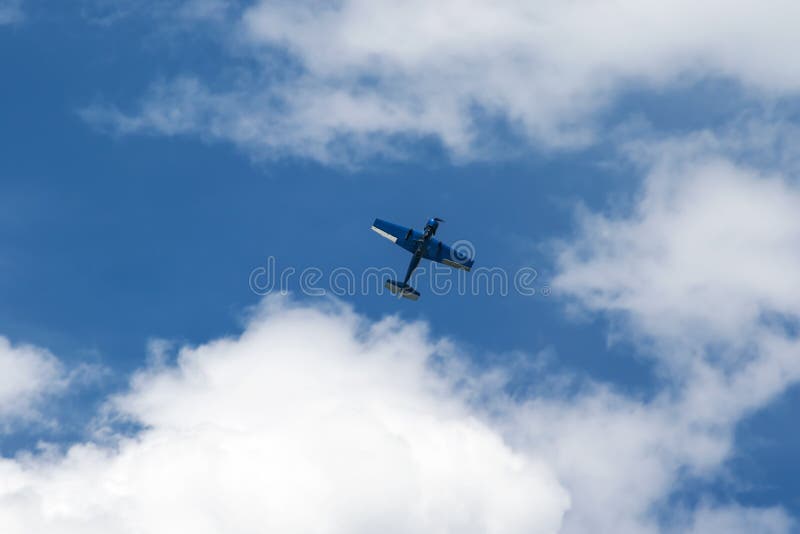 Blue Plane Flying in the Sky Stock Image - Image of engine, show: 71329643