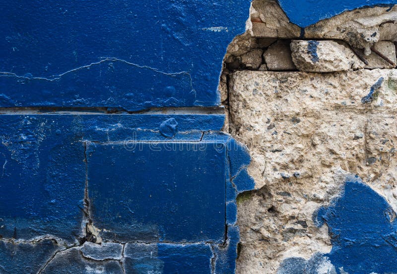 The Blue Plaster Wall Shattered from the Impact Stock Image - Image of ...