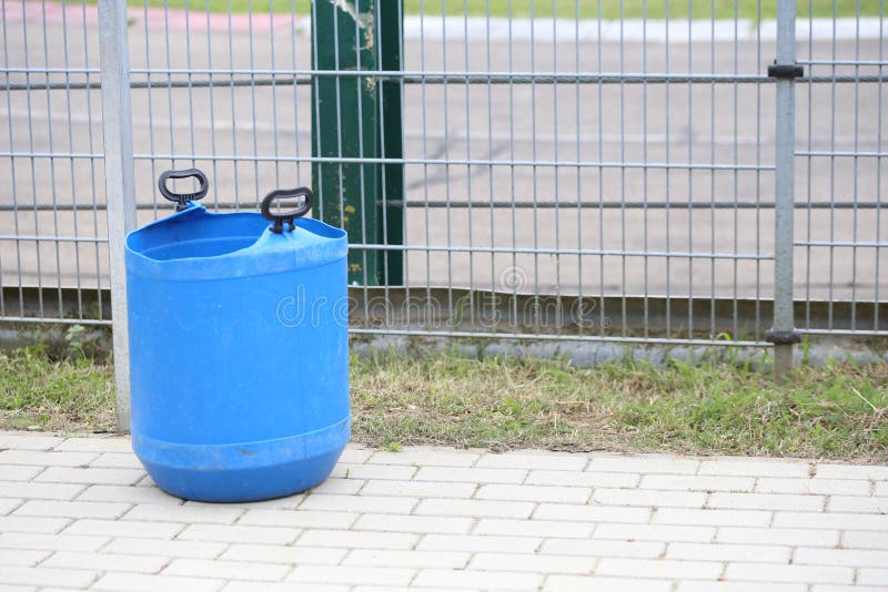 Blue Plastic Barrel on the Street Stock Image - Image of clean, blue ...
