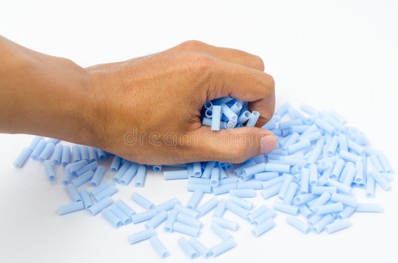 Blue Plastic Bead in Human Hand Stock Photo - Image of pellets, blue ...