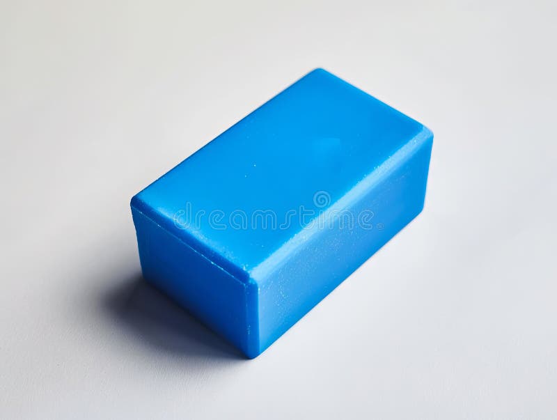 A Blue Plastic Block on a White Surface Stock Image - Image of square ...