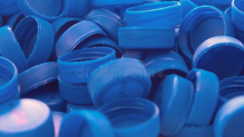 Plastic Bottle with a Plastic Straw Thrown As Trash in the Waves Stock ...