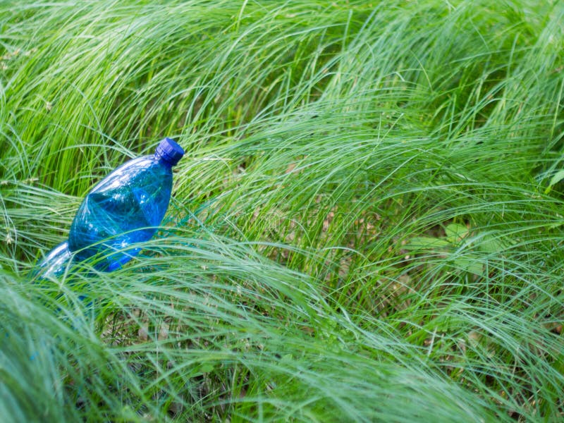 Blue Plastic Bottle Littering the Grass Stock Image - Image of recycle ...