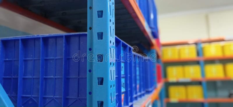 Blue Plastic Boxes Neatly Arranged on a Shelf that Looks Beautiful ...