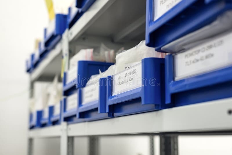 Blue Plastic Boxes Placed in Shelves. Stock Image - Image of inside ...