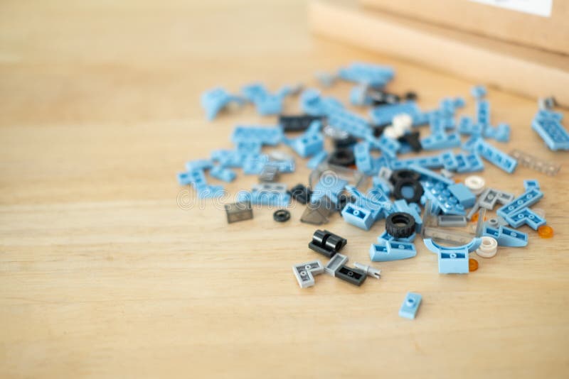 Blue Plastic Building Blocks on Wood Table Editorial Photo - Image of ...