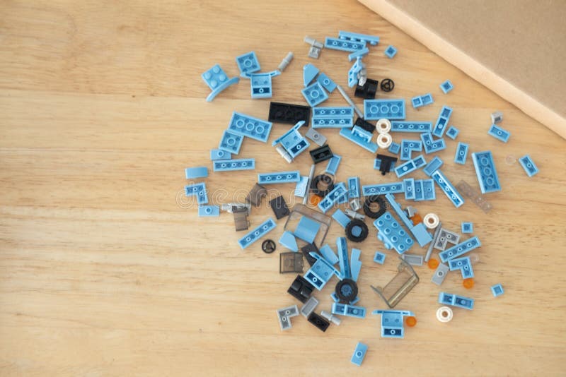 Blue Plastic Building Blocks on Wood Table Stock Image - Image of blue ...