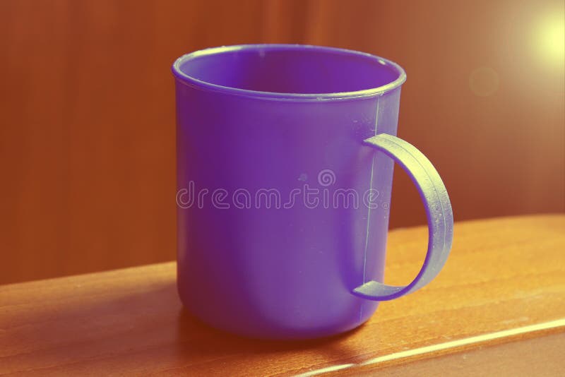 Blue Plastic Camping Cup on Wooden Plank Stock Image - Image of dessert ...
