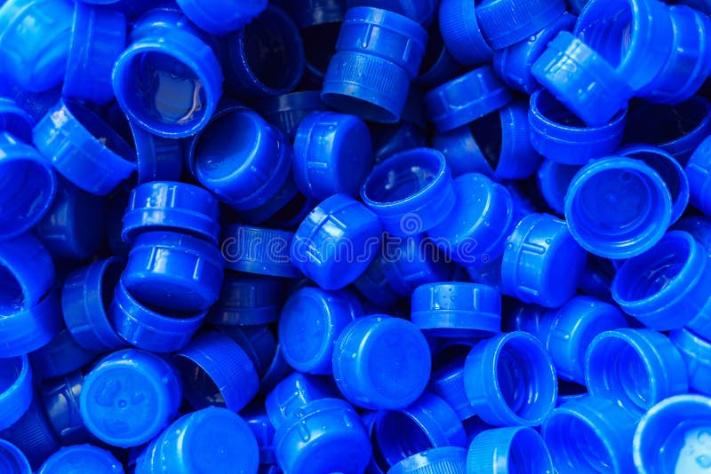 Blue Plastic Caps Used To Seal Beverage Bottles Stock Photo - Image of ...