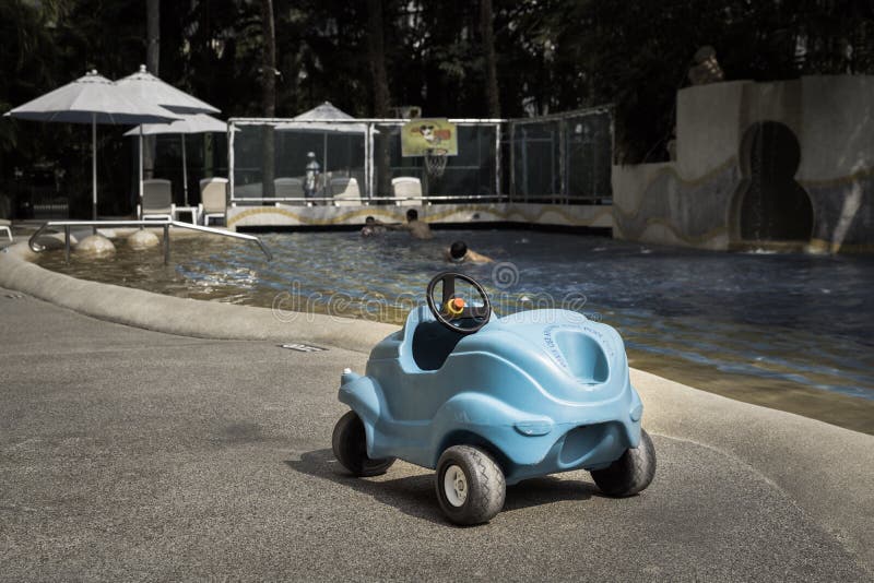 Blue Plastic Car for Kid at Swimming Pool Stock Photo - Image of blue ...