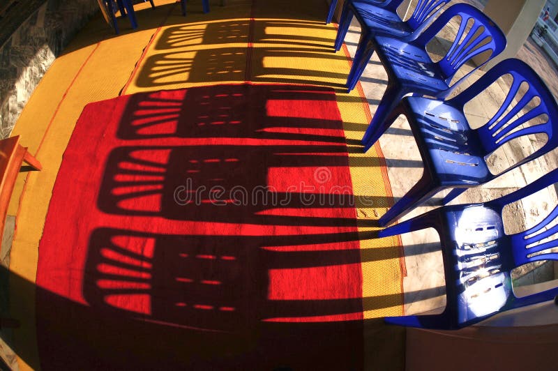 Blue Plastic Chair and Shadow on Carpet Stock Image - Image of design ...