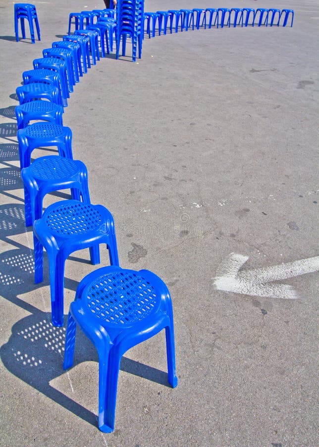 Blue plastic chairs stock image. Image of arena, business - 35739085