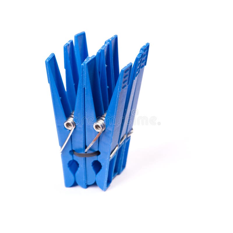 Blue plastic clothespins stock photo. Image of collection - 140293192