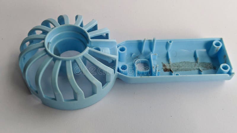 A Blue Plastic Component with a Fan-like Structure. the Component Has a ...