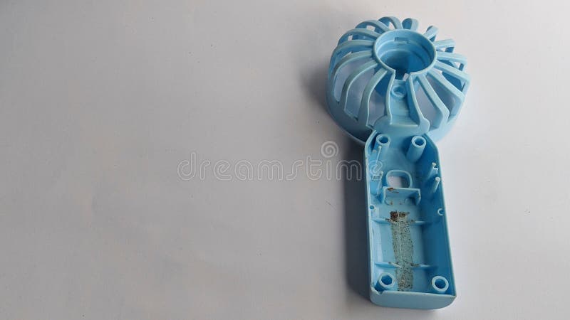 A Blue Plastic Component with a Fan-like Structure. the Component Has a ...
