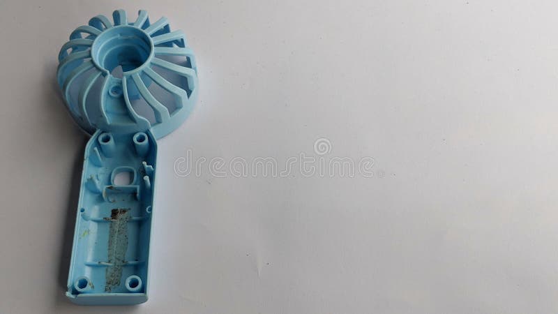 A Blue Plastic Component with a Fan-like Structure. the Component Has a ...