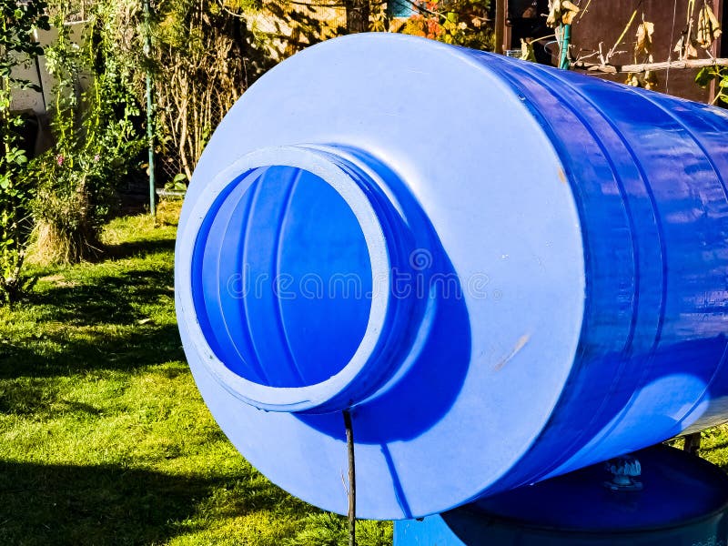 A Blue Plastic Container for Clean Water is Drying in the Sun Stock ...