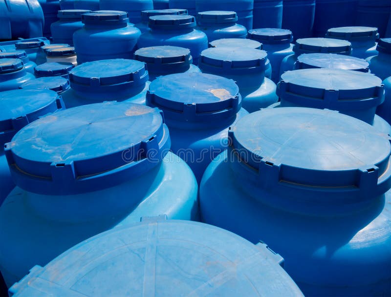 Blue Plastic Containers for Storage of Liquids in the Storage Area ...