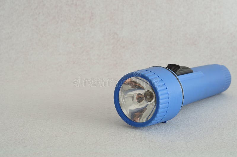 A blue plastic flashlight stock photo. Image of tool - 83268184