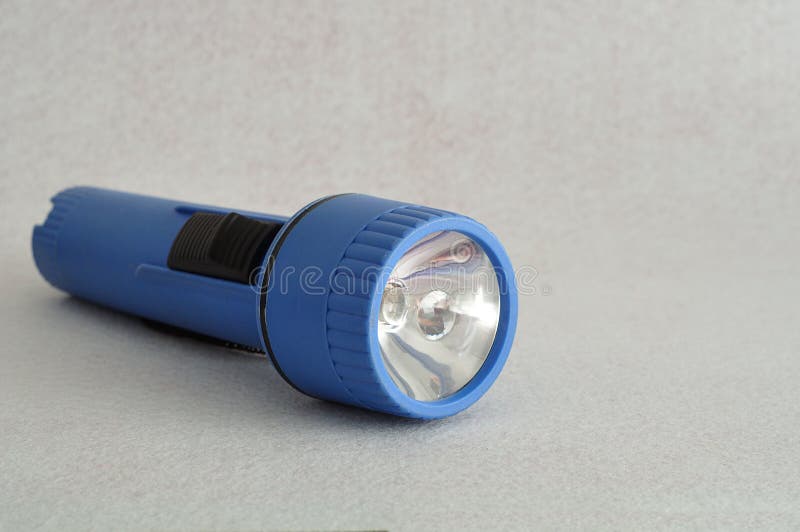 A blue plastic flashlight stock photo. Image of tool - 83268184